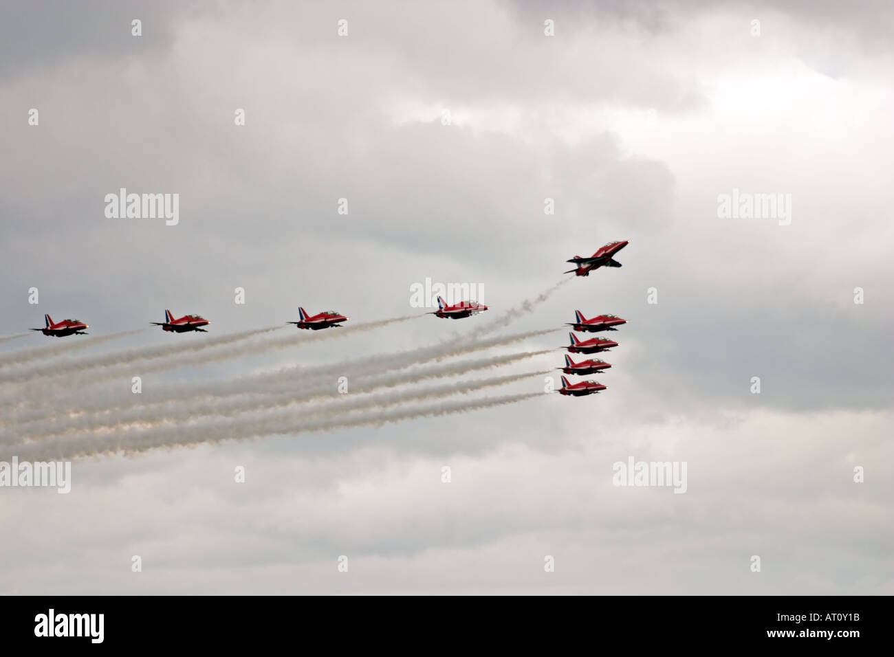 RAF Red Arrows BAE Hawk jet trainer aircraft break from close formation ...