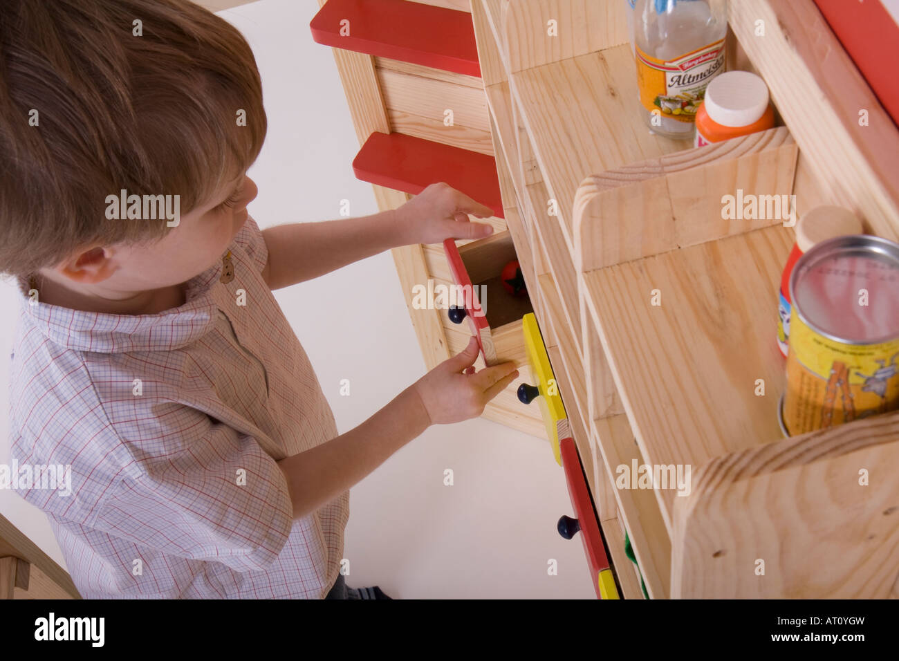 little boy playing in grocery shop for children Stock Photo - Alamy