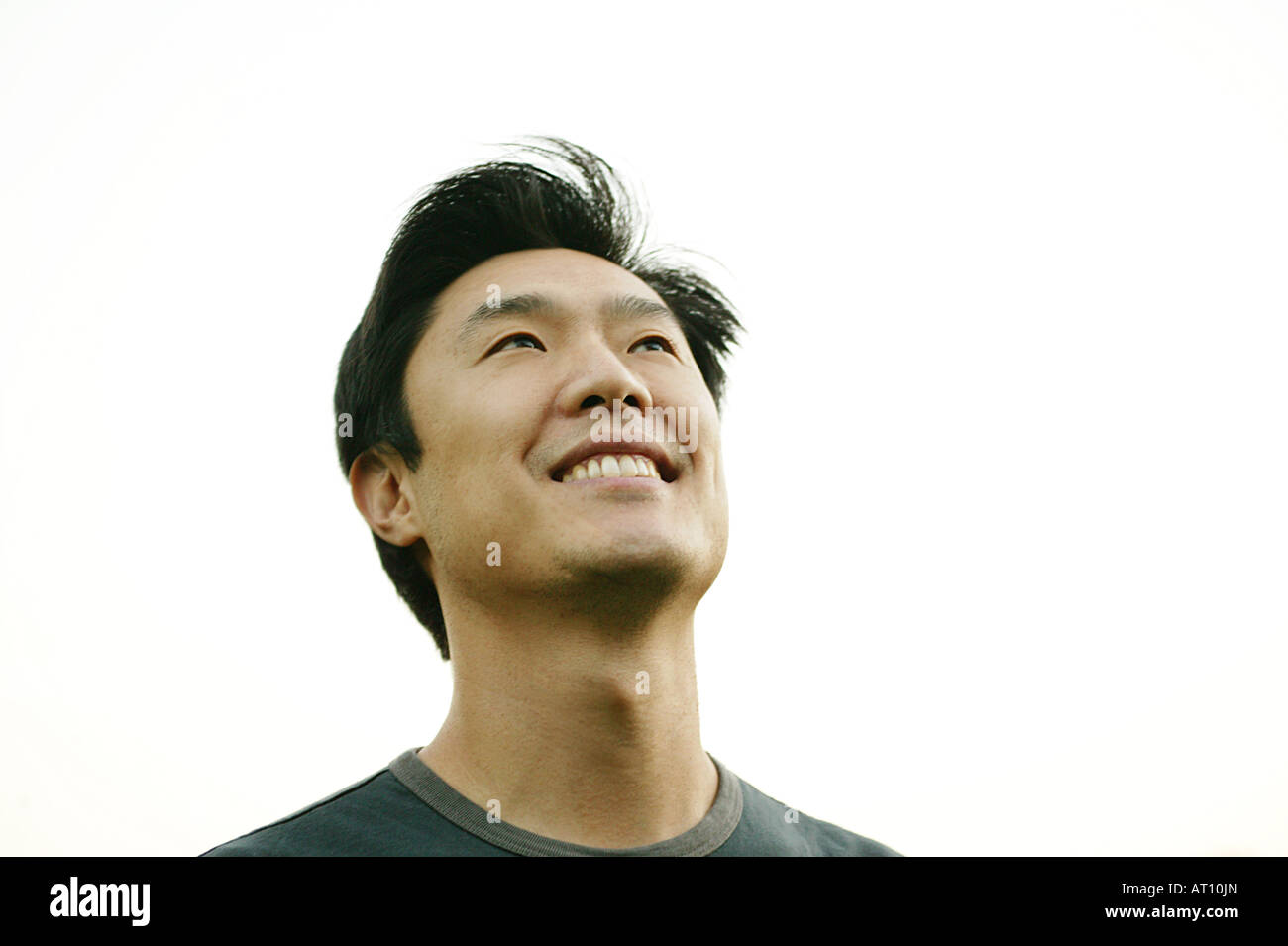 Asian men smiling hi-res stock photography and images - Alamy