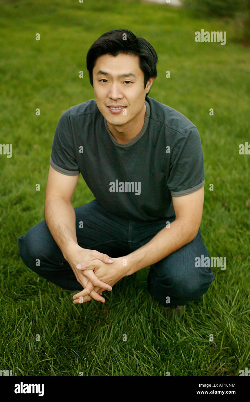 Man Outside on Grass Stock Photo - Alamy