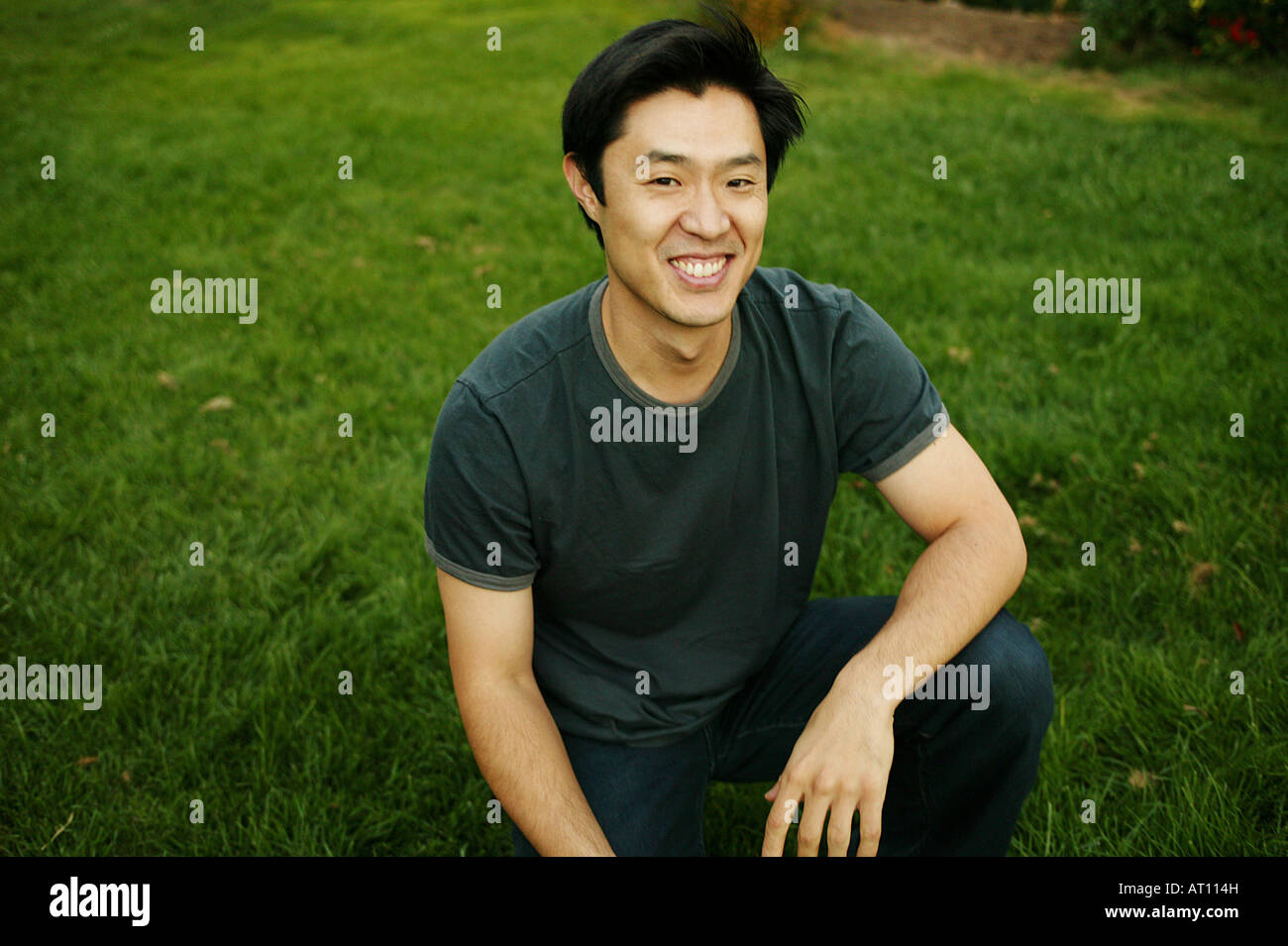 Man Outside on Grass Stock Photo - Alamy
