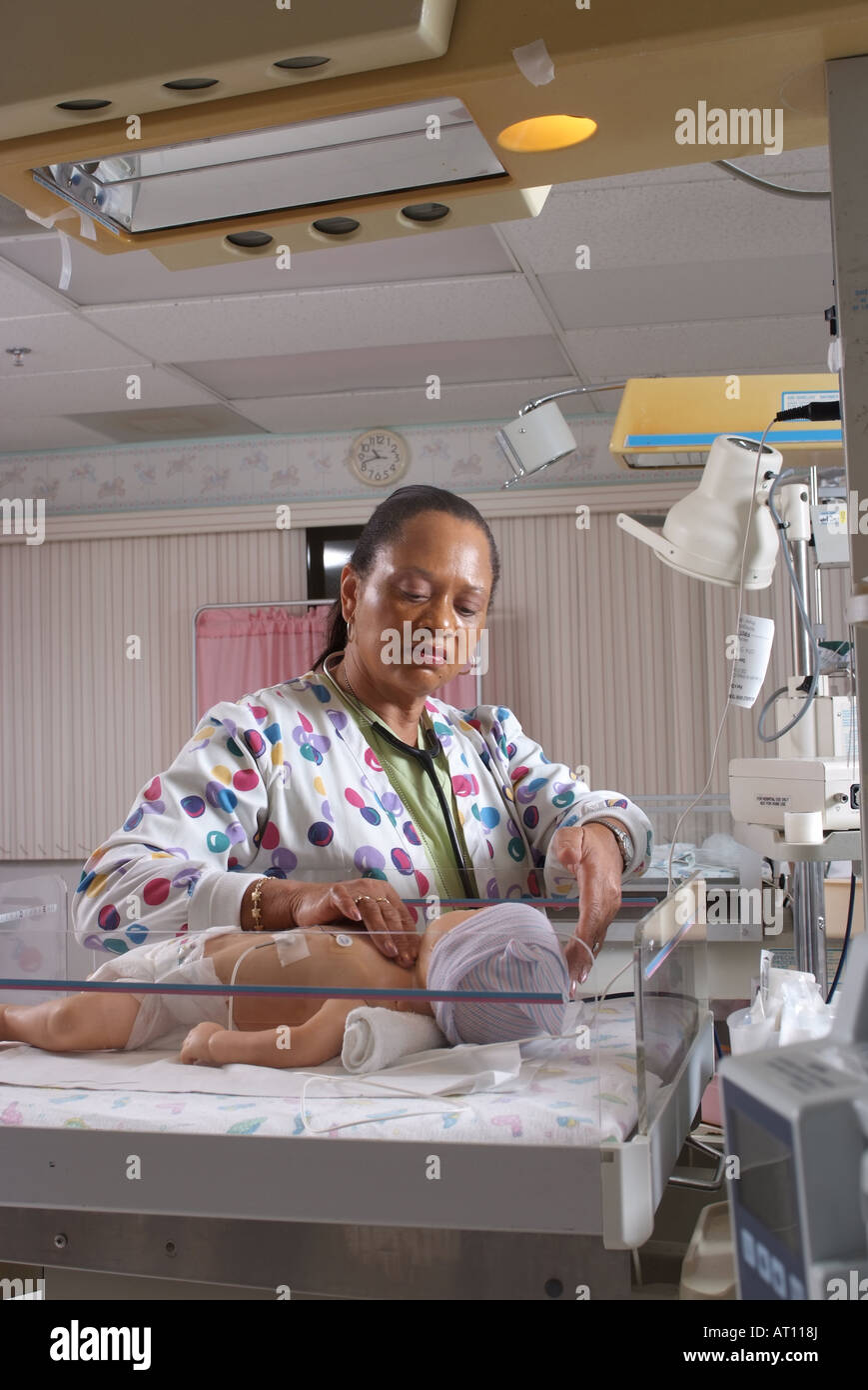 Heath Care Hospital Woman nurse in training practices on a prosthetic ...