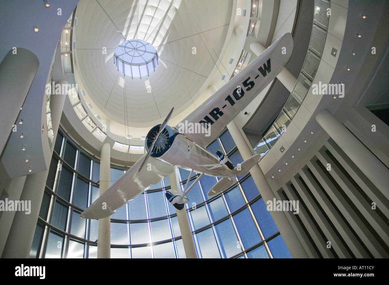 A replica of Oklahoma aviator Wiley Post's Winnie Mae hangs in the ...