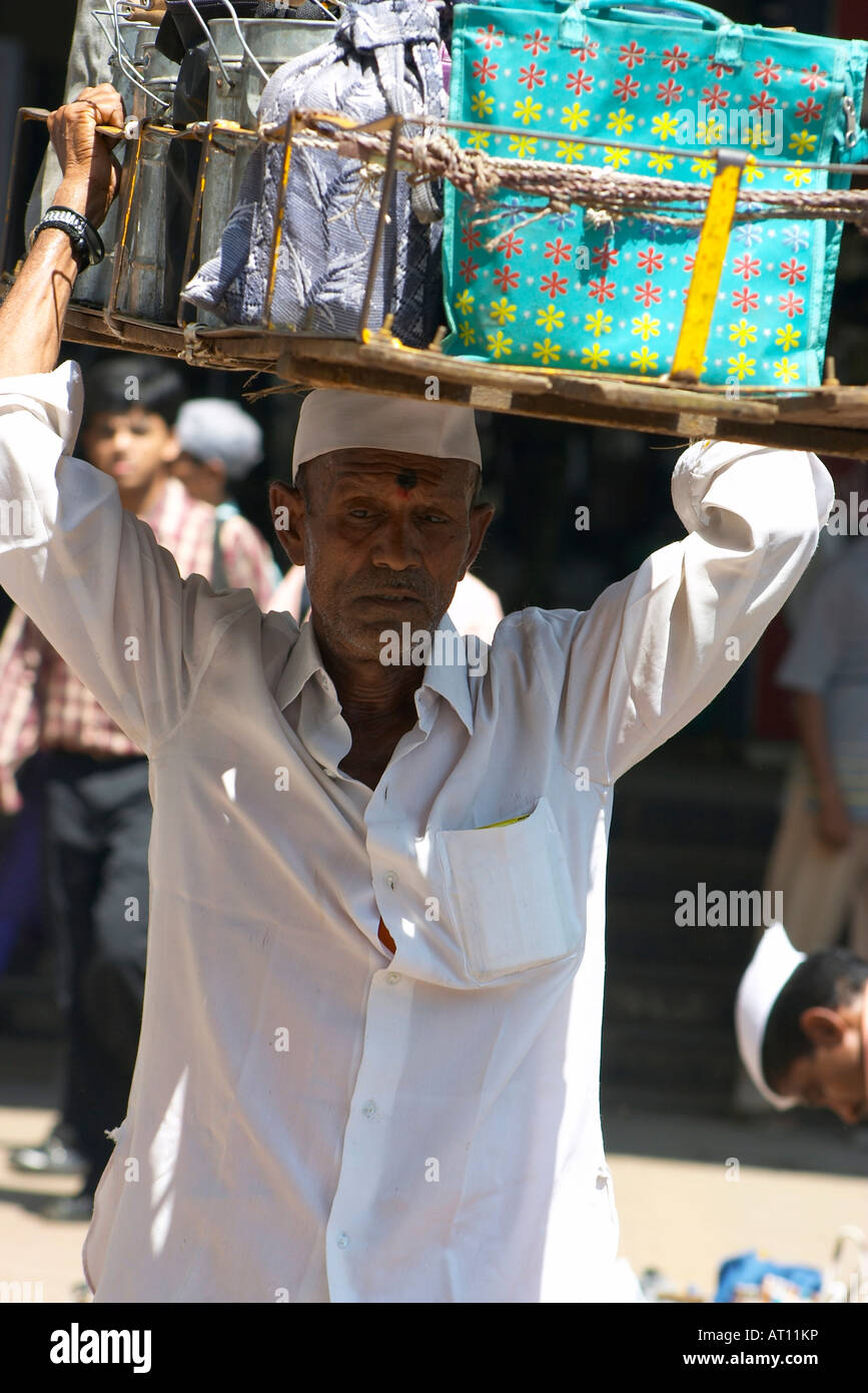 man carrying heavy load Stock Photo - Alamy