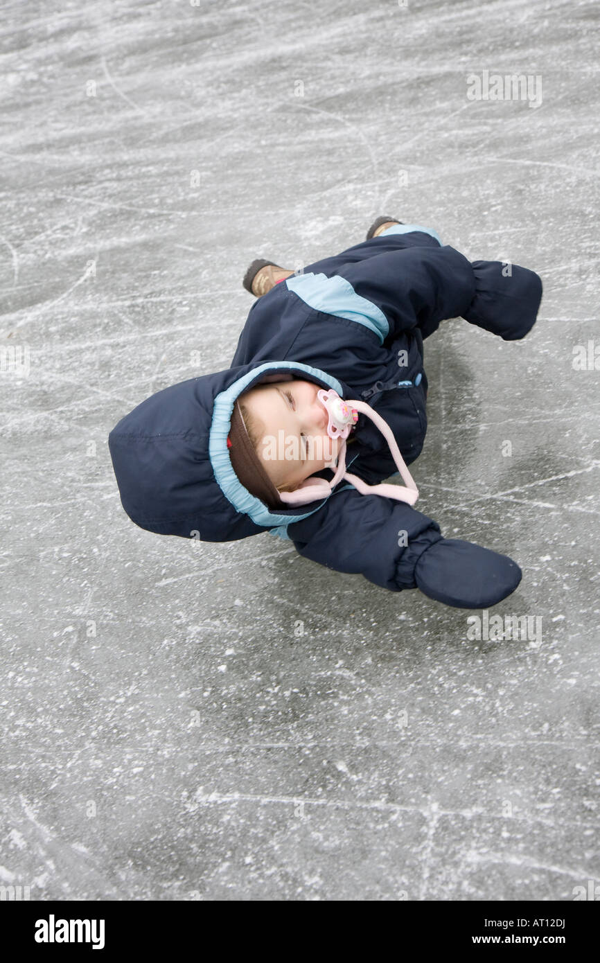 little boy lying on ice Stock Photo - Alamy