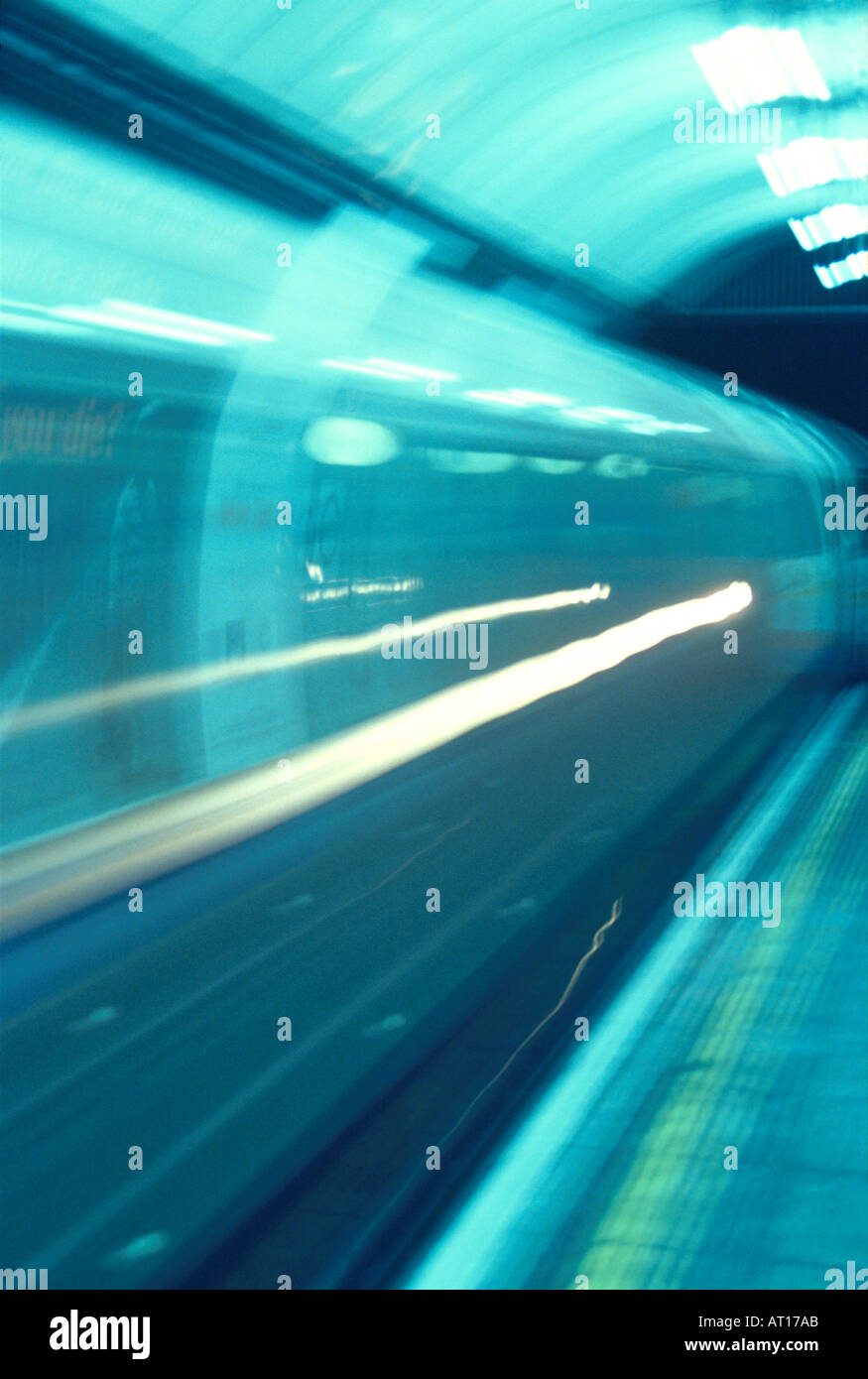 Underground train coming through tunnel Stock Photo - Alamy
