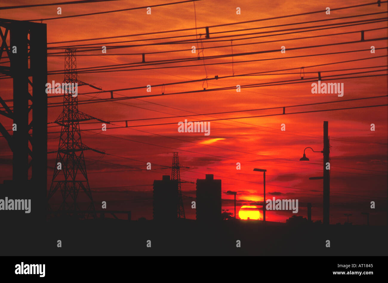 sunset sunrise over cityscape Stock Photo - Alamy