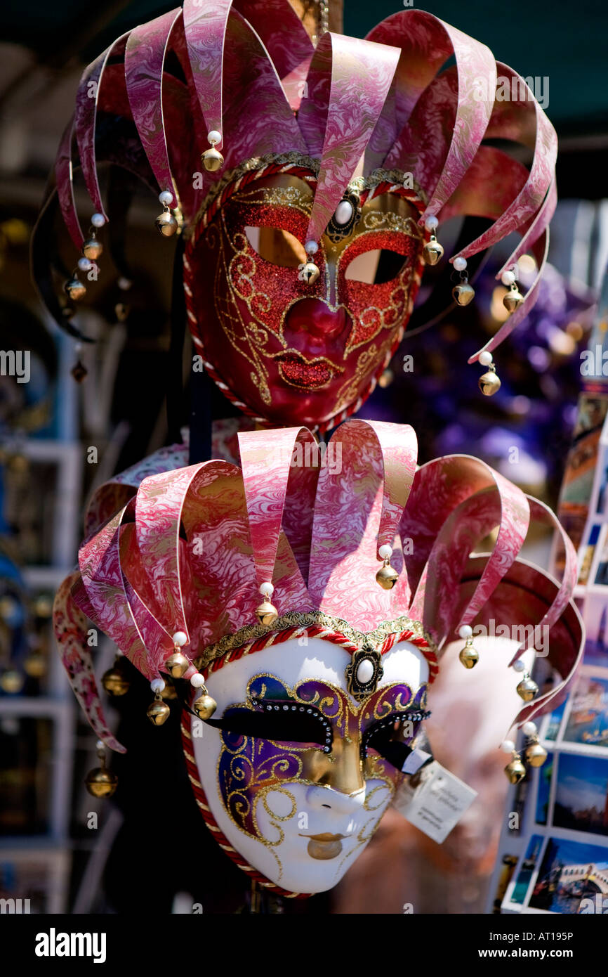 Carnival masks hang in a vendor's stall in Venice Italy home of ...