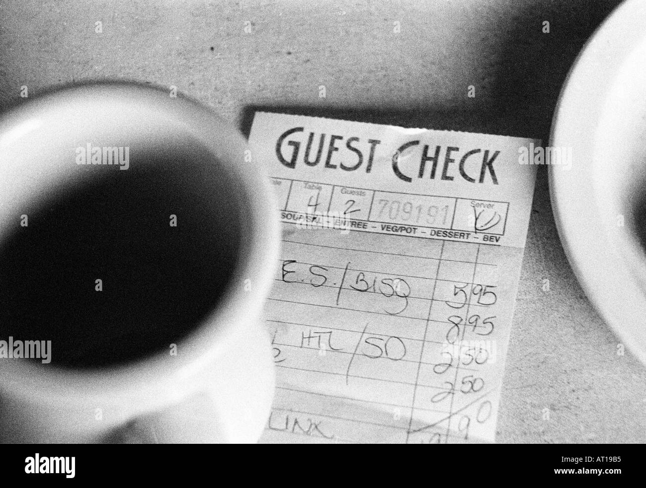 Coffee Cup and Check at a Diner Stock Photo - Alamy
