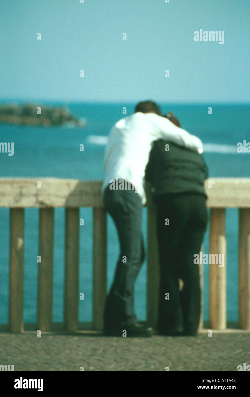 Couple embrace consolation hi-res stock photography and images - Alamy