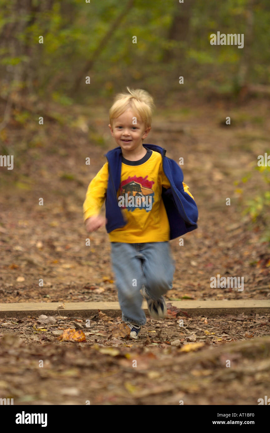 Child Running Down Nature Trail Tennessee Stock Photo - Alamy