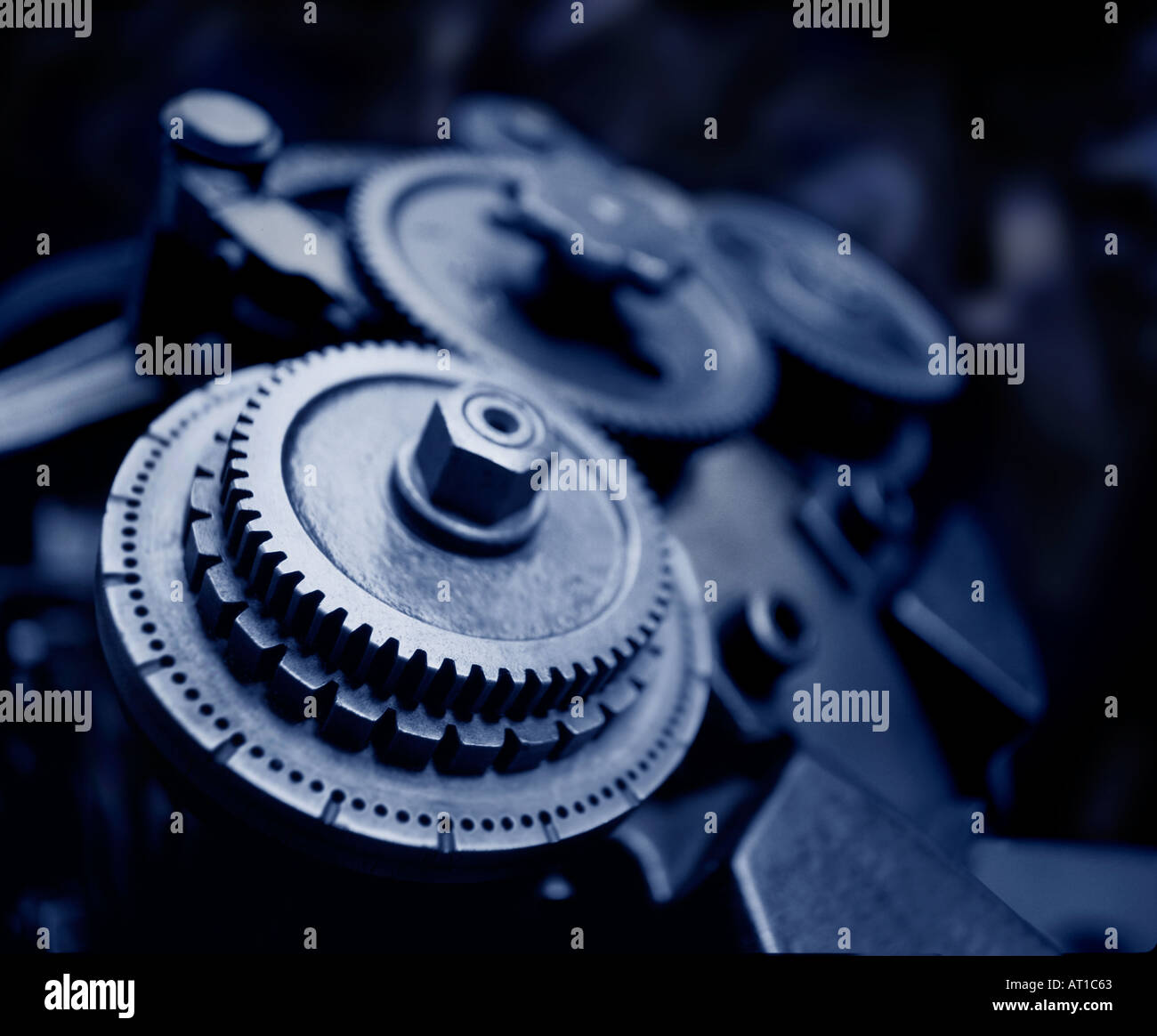 Working cogs close Stock Photo - Alamy