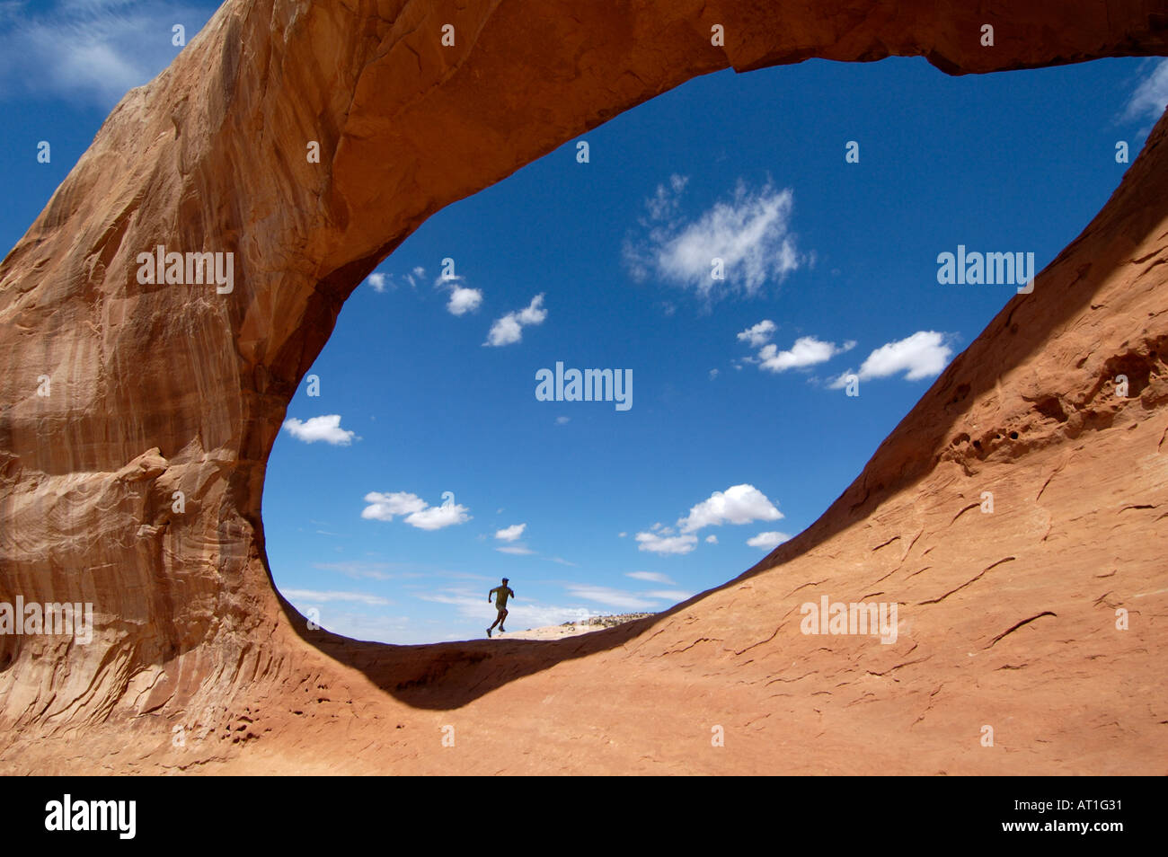Male running through desert hi-res stock photography and images - Alamy