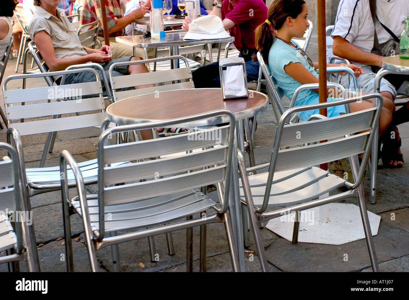 empty terrace of spain bar with metalic chairs and tables Stock Photo ...