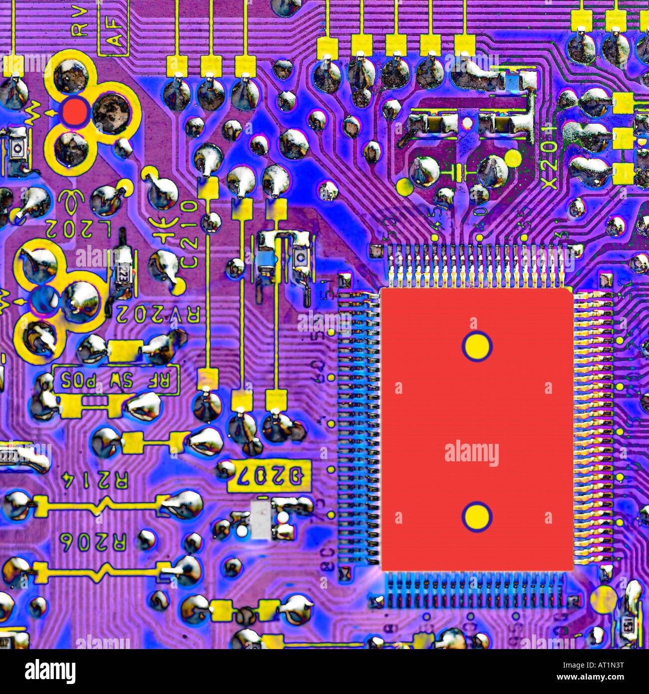 Electronic device red chip Stock Photo - Alamy