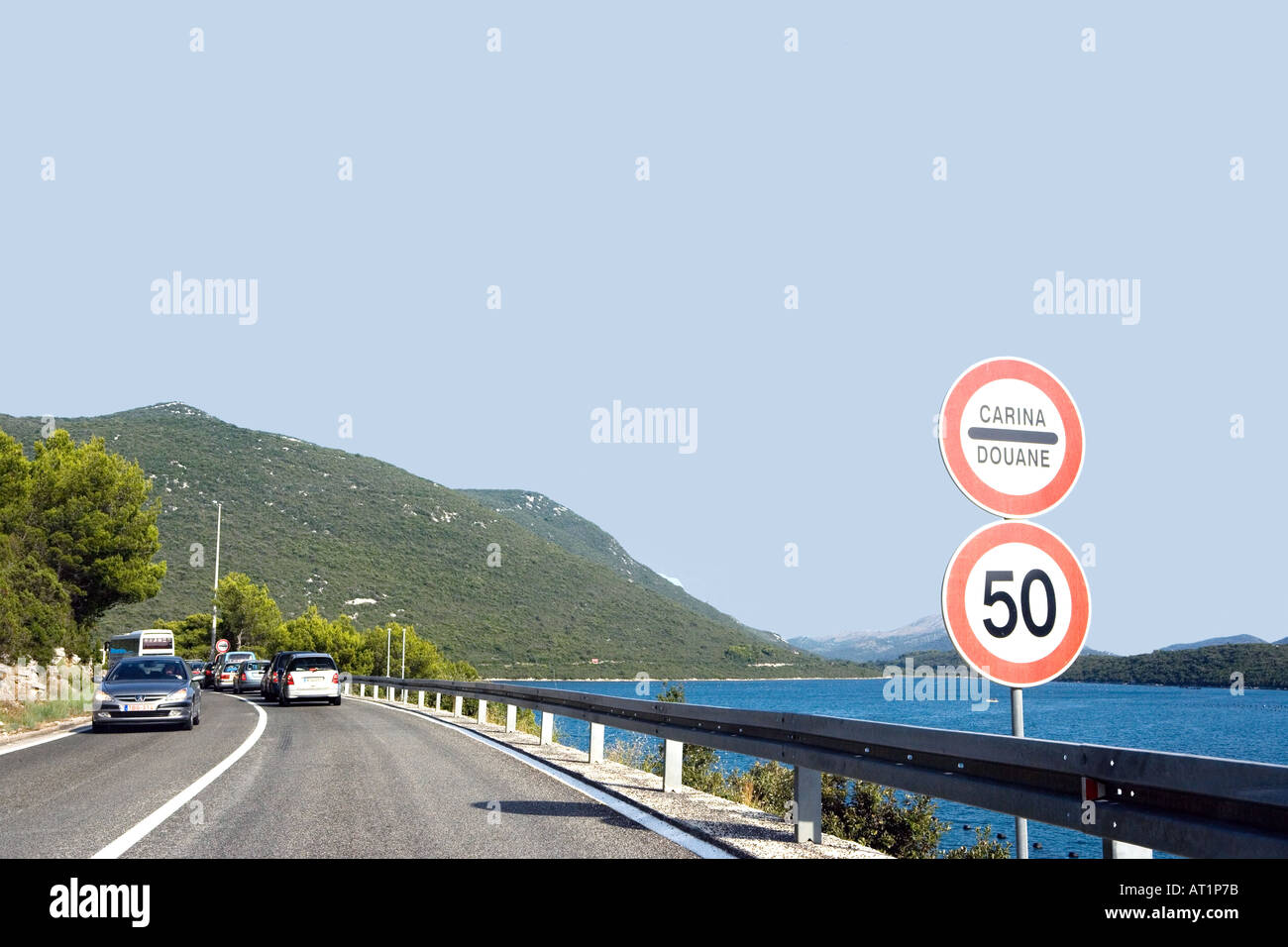 Border crossing signs as Croatian coast road from Dubrovnik to Split ...