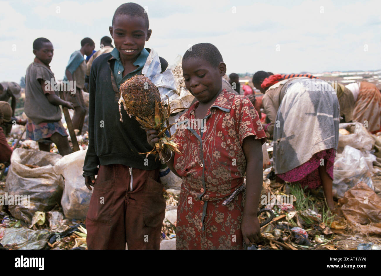Street children collecting garbage in Korogocho slum in Nairobi, kenya ...