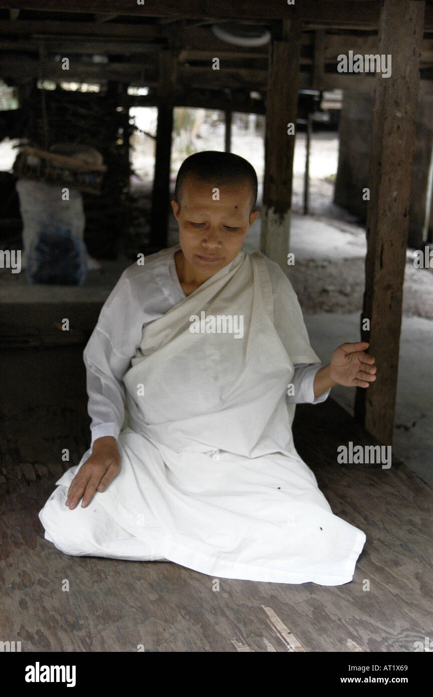 Buddhist nun meditating hi-res stock photography and images - Alamy