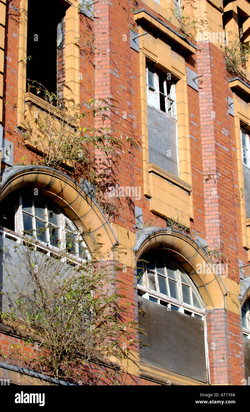 Derelict and boarded up Young Mens Christian Association YMCA building ...