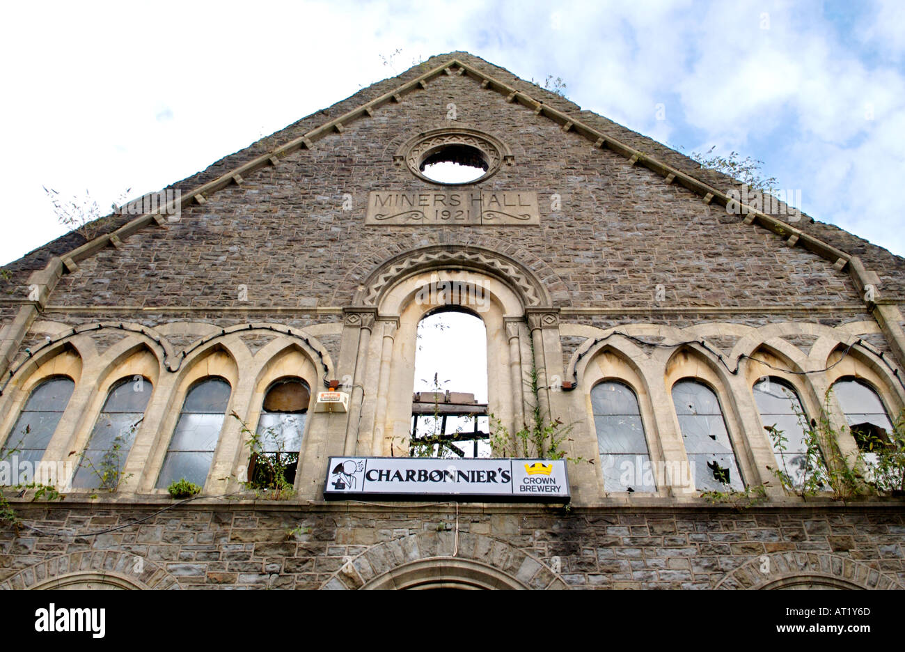 Derelict former Miners Hall dated 1921 at Merthyr Tydfil in the South ...
