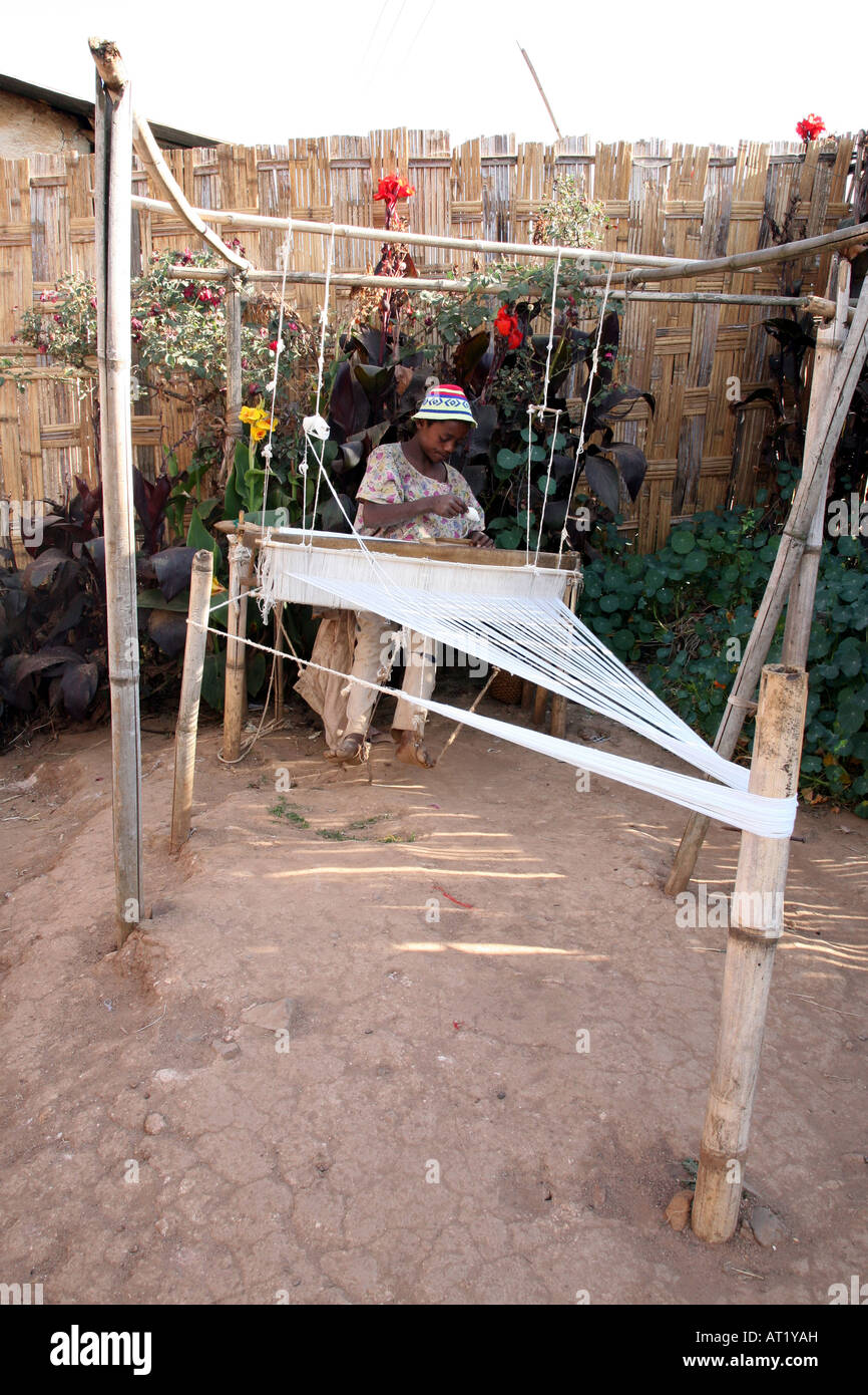 African woman doing traditional weaving in Dorze tribal village ...