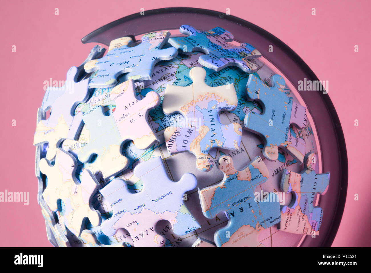 Globe with Jigsaw Puzzle Pieces Stock Photo - Alamy