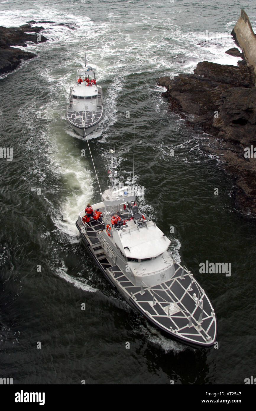 U S Coast Guard vessels conduct a training drill at Depoe Bay Oregon ...
