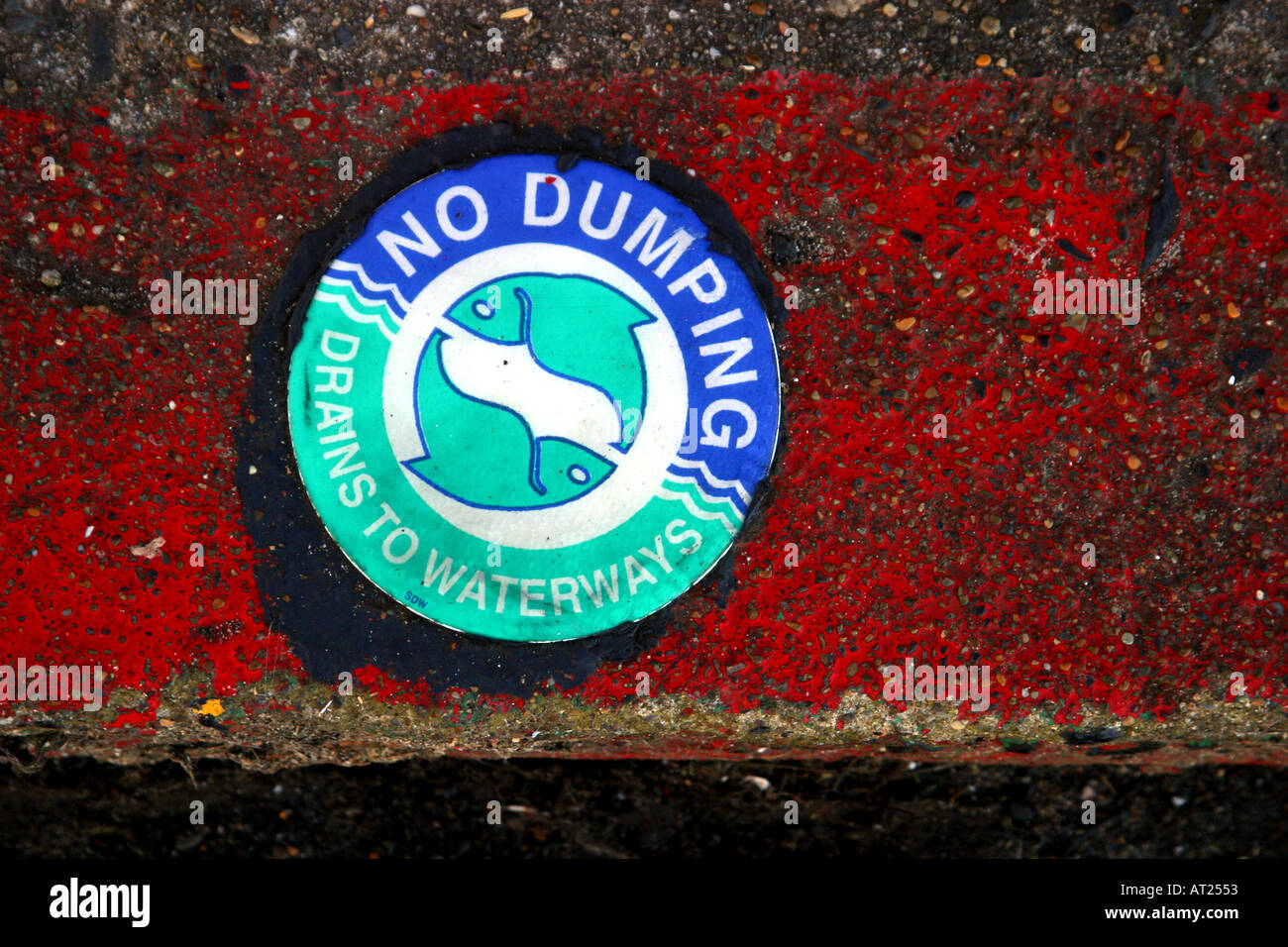 No Dumping Drains to Waterways sign on a street gutter in Depoe Bay ...