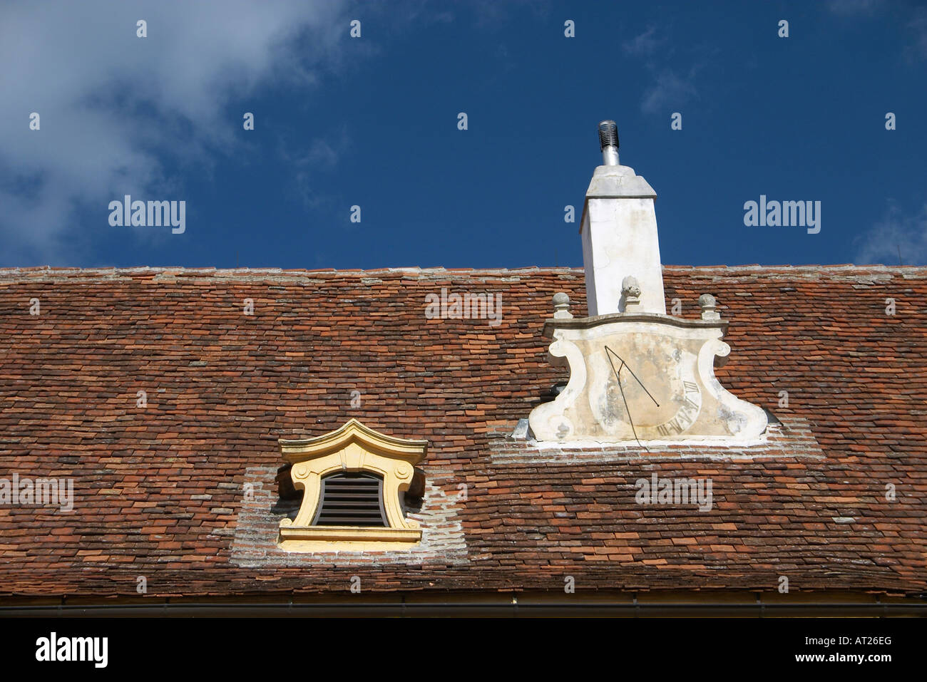 Sun dial on a roof Stock Photo - Alamy