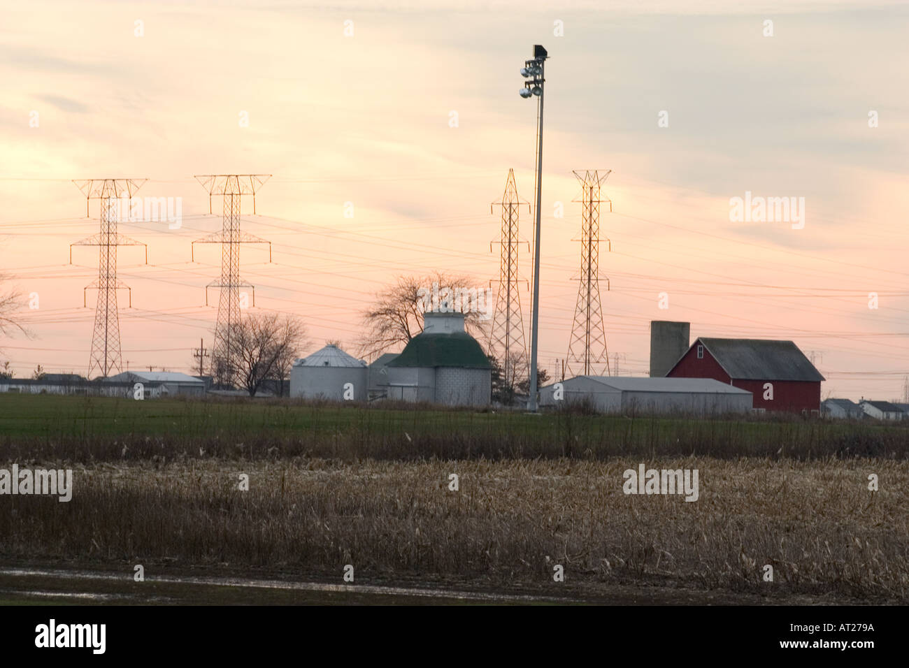 Contrast of power lines running through farm by Cambridge at Carillon ...