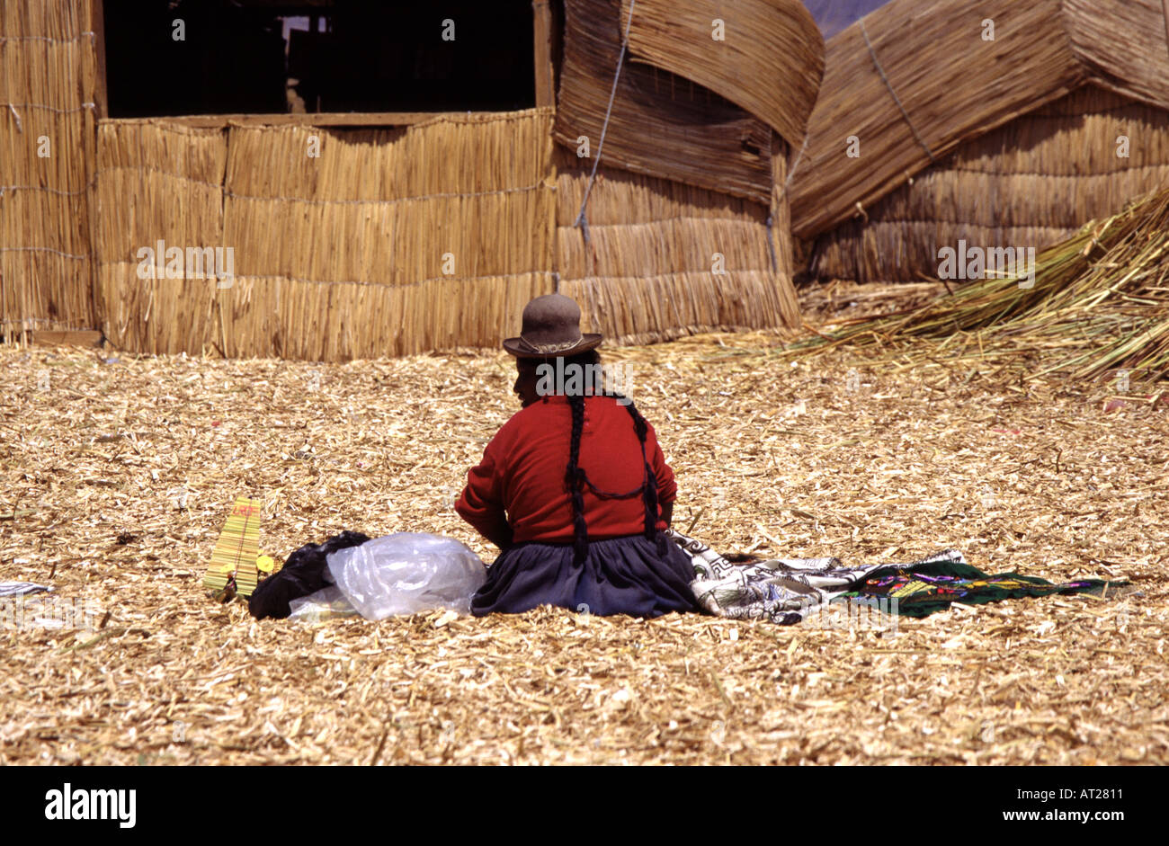 Woman on one of the floating reed Uros Islands on Lake Titicaca near ...