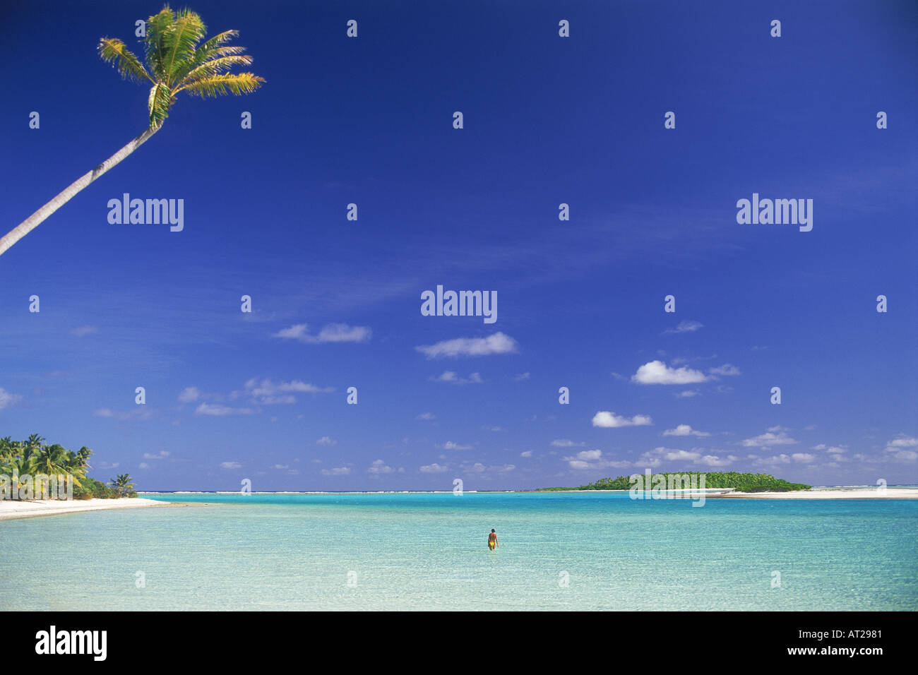 Woman alone in a tropical island lagoon Stock Photo - Alamy