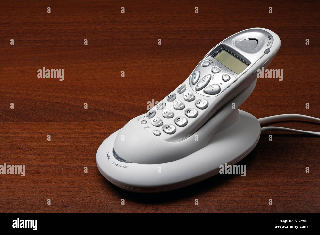 Telephone on desk Stock Photo - Alamy