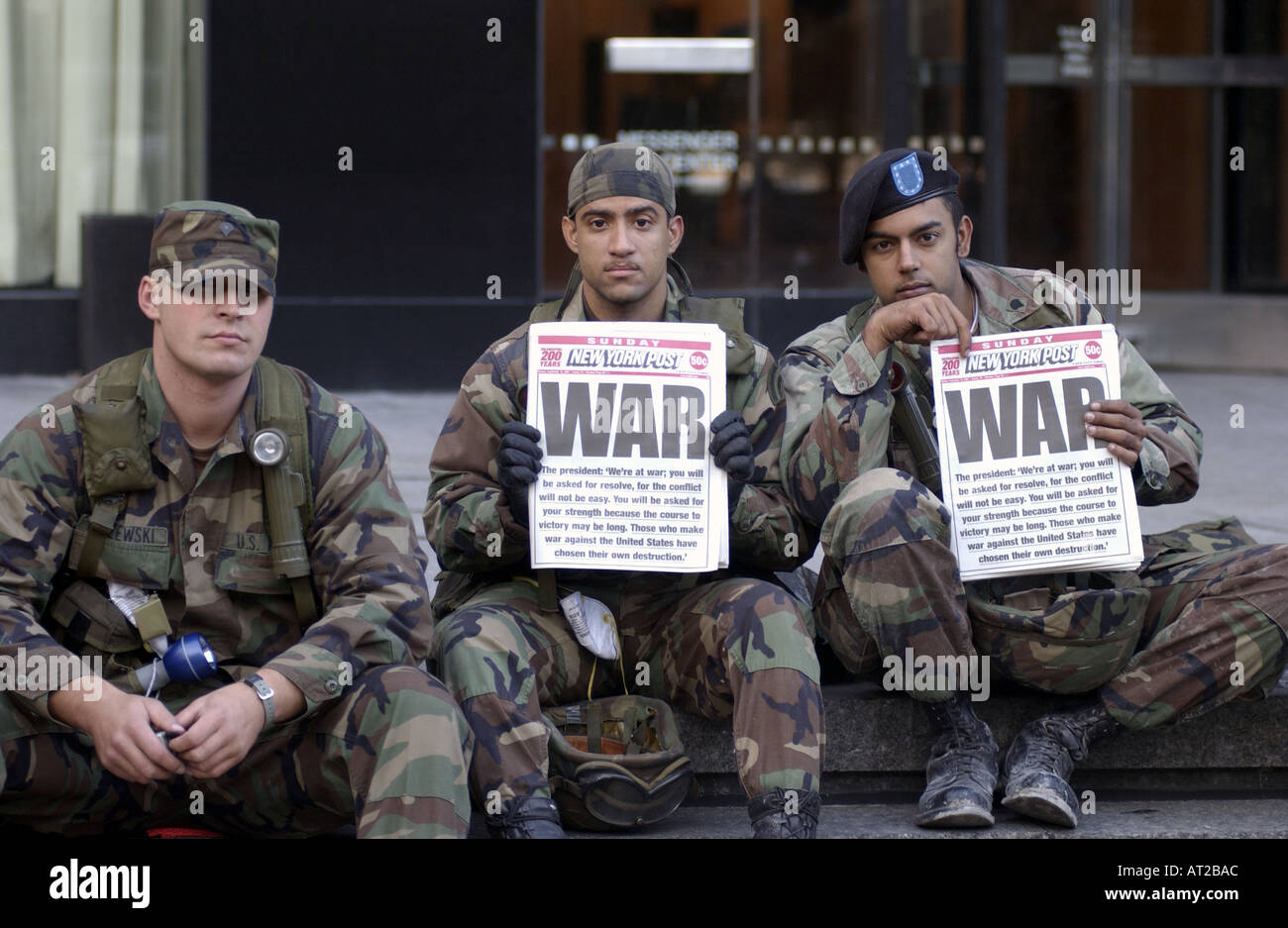 US Soldiers reading newspaper headline of WAR three days after 9 11 ...