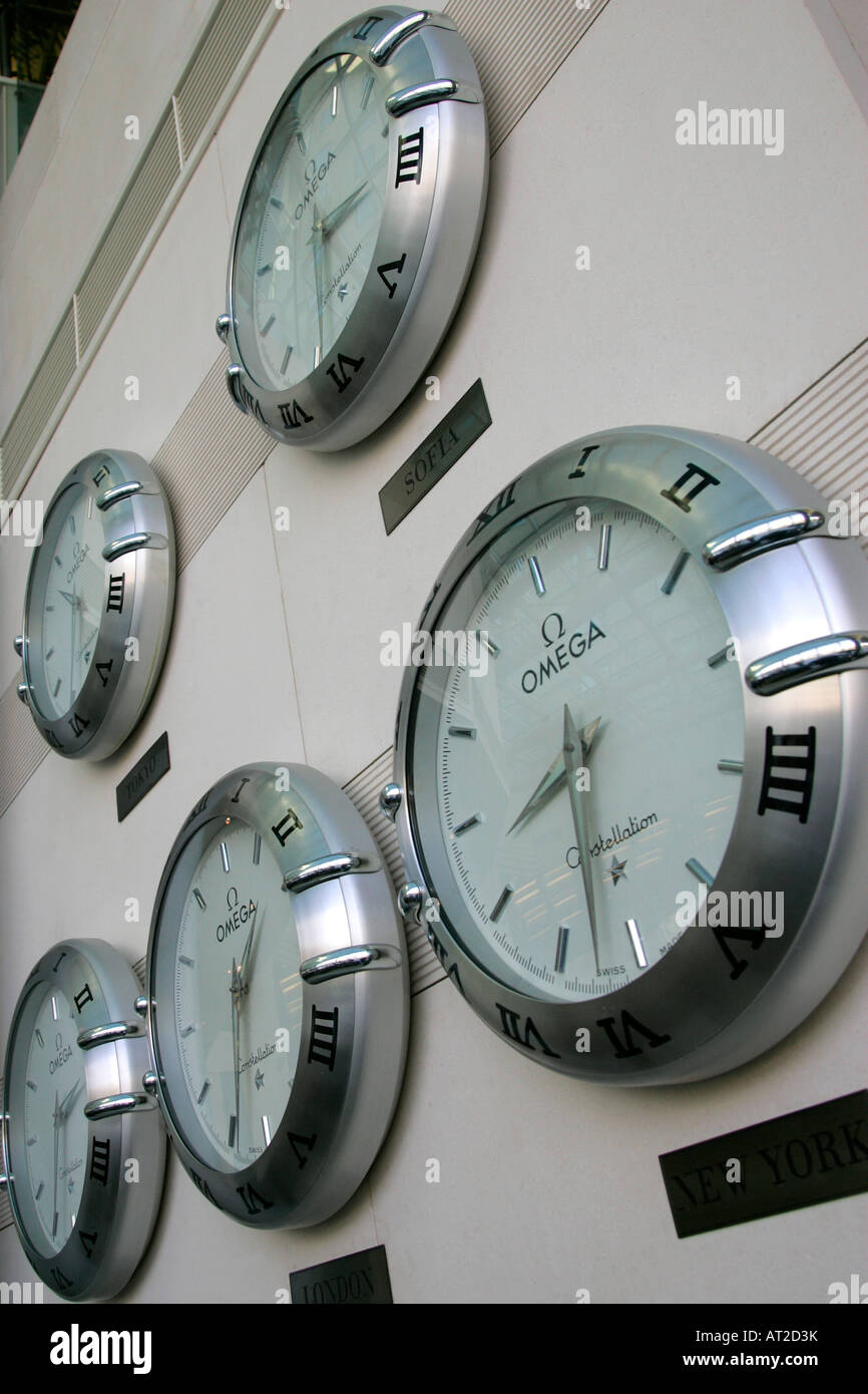 Omega Wall clock time city center street architecture building ...