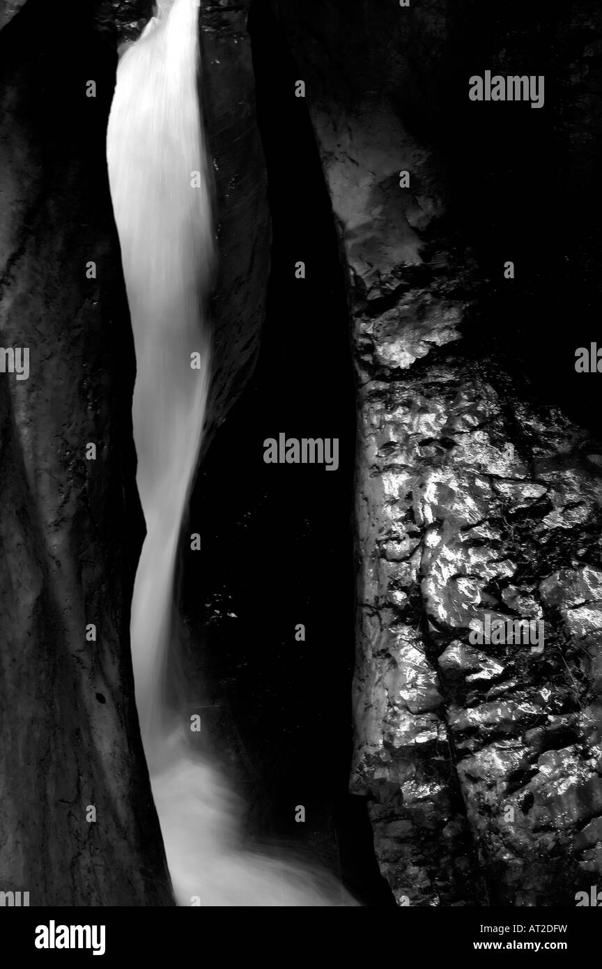 Waterfall in a cave Stock Photo - Alamy