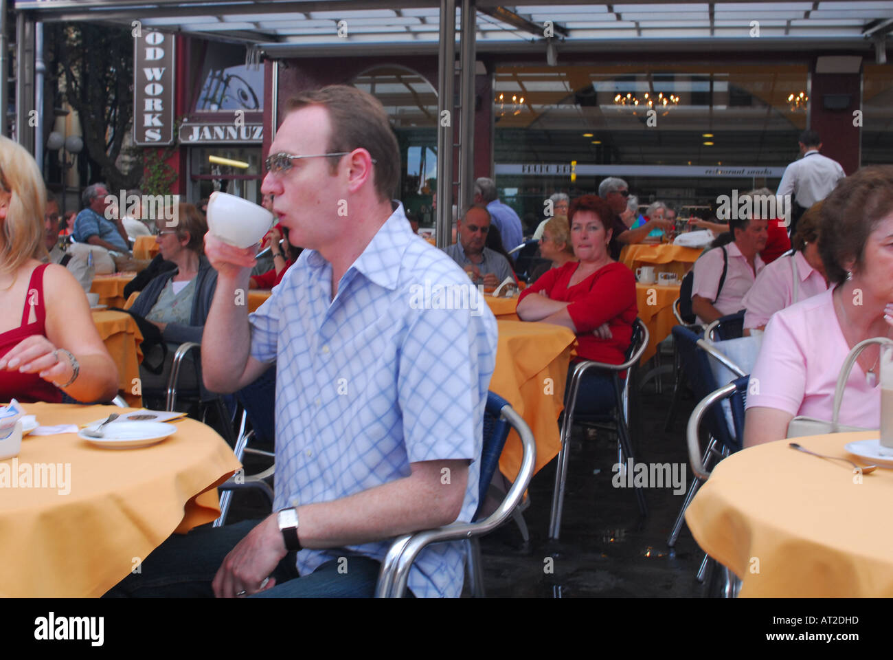 People watching at an Italian Cafe Stock Photo - Alamy