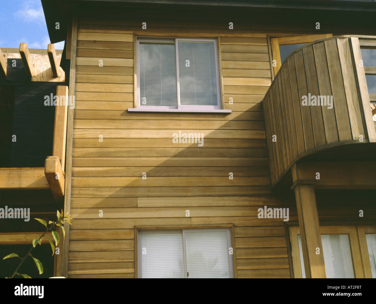 Newbuild modern house with wooden cladding Stock Photo - Alamy
