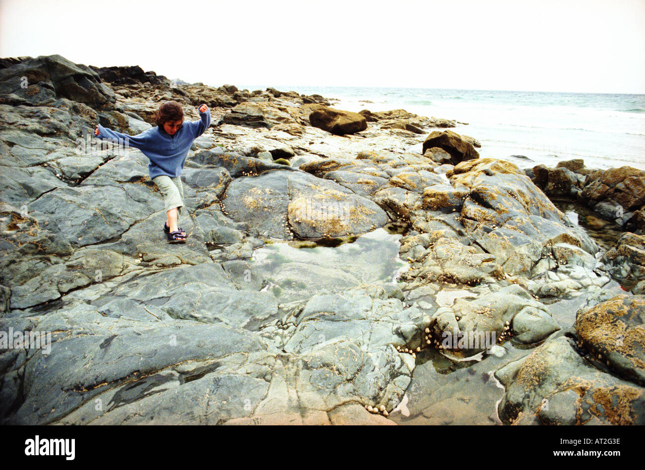 Girl Walking Over Rocks High Resolution Stock Photography and Images ...