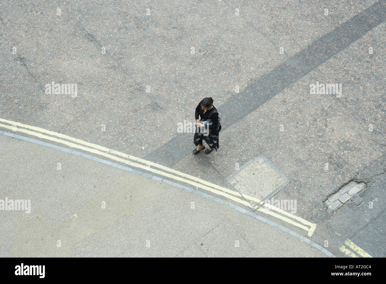 One girl walking down street hi-res stock photography and images - Alamy
