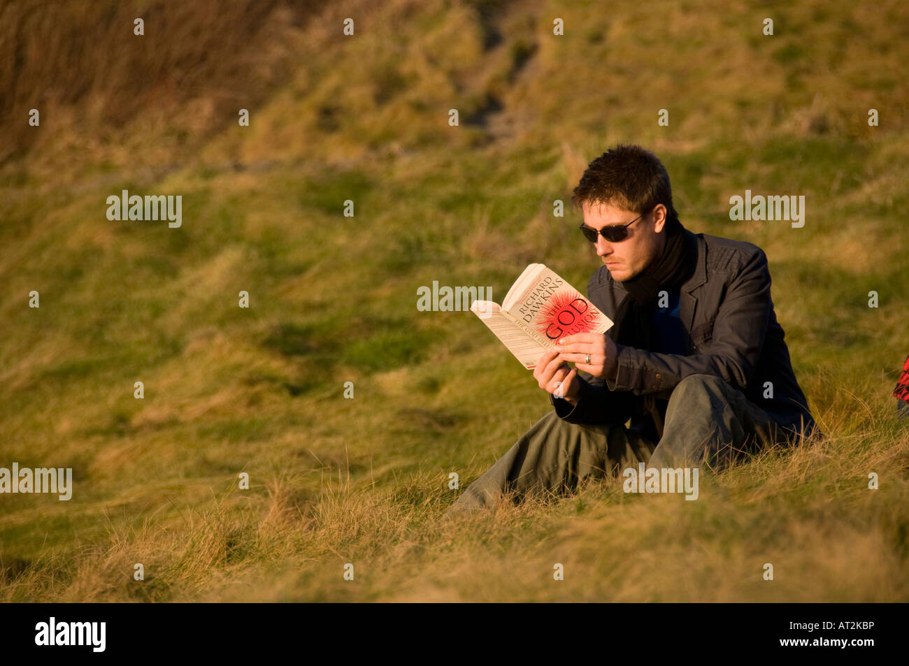 Aberystwyth university student reading Richard Dawkins book 'The God ...