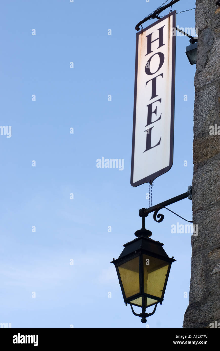 An old hotel sign at dusk Stock Photo - Alamy