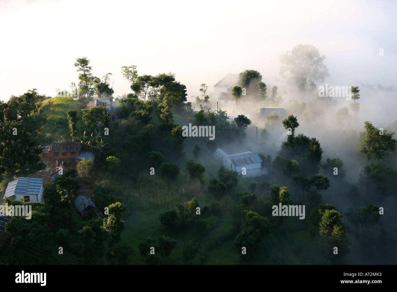 Cloud lifting as the sun rises from Raniban Hill with its World Peace ...