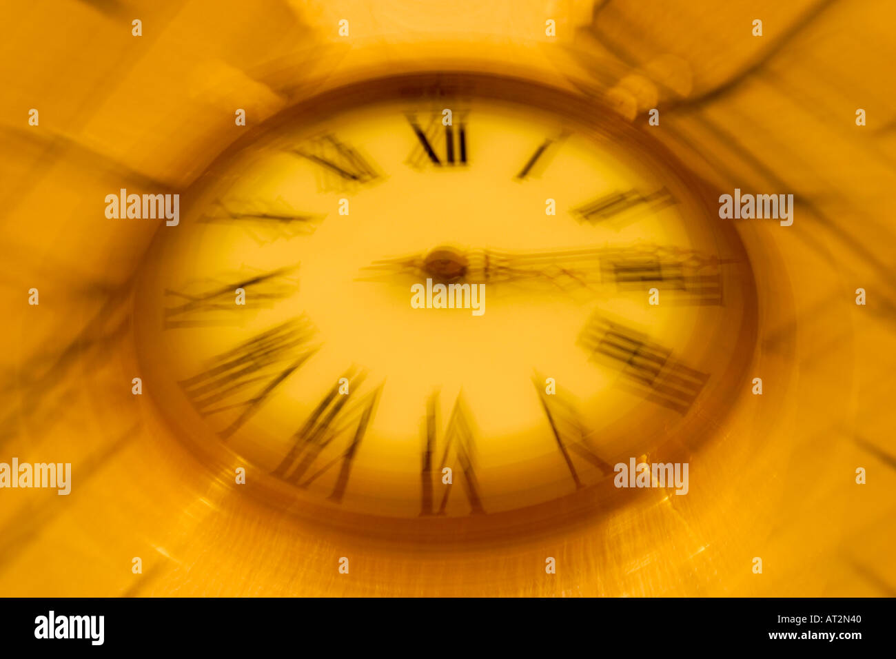 Old Roman numeral clock attached to a tile ceiling in an office ...