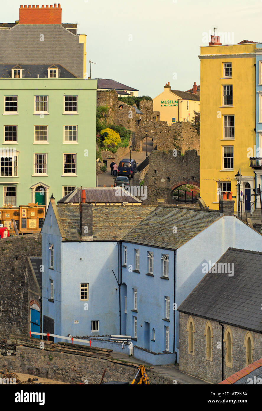 colourful harbour side buildings at Tenby in a soft warm sunlight Stock ...
