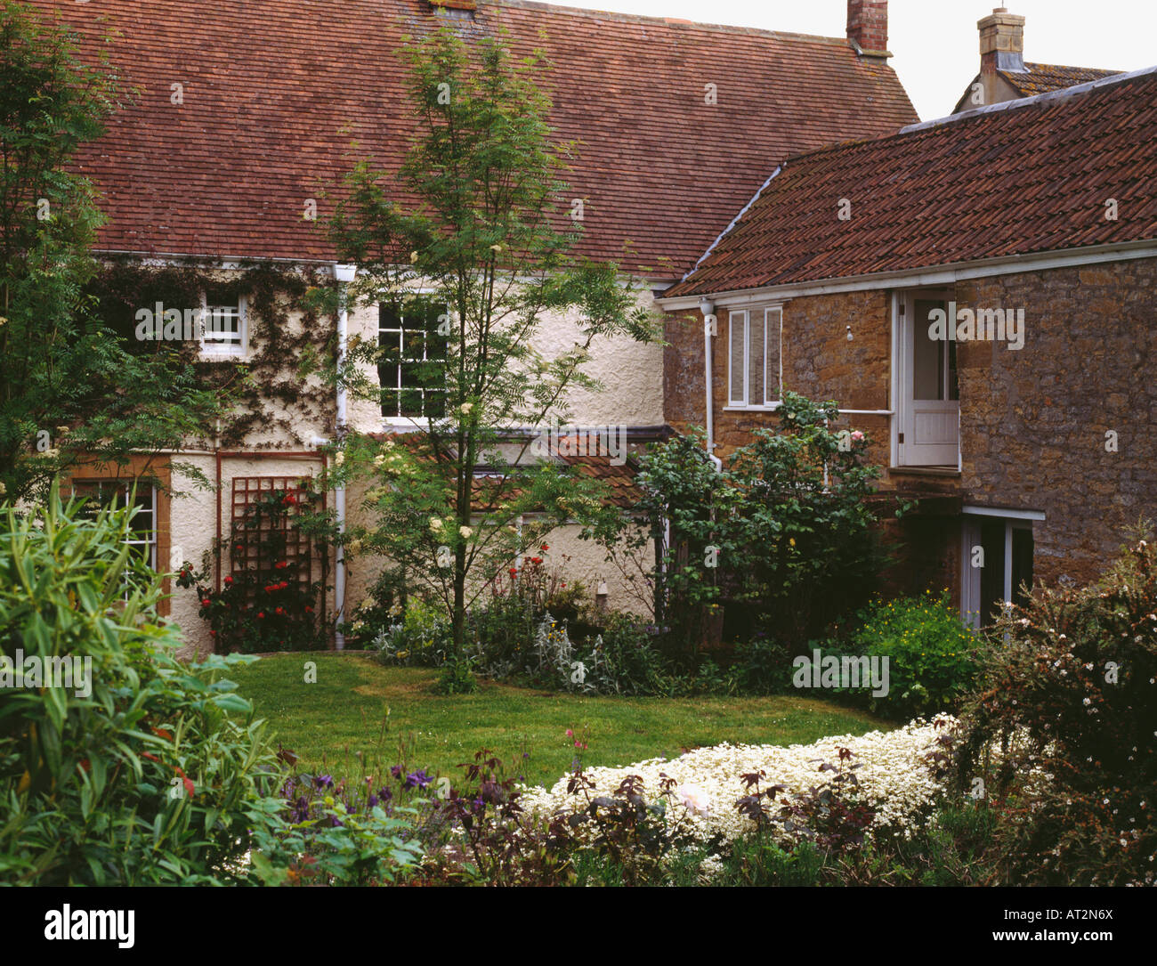 Old country house with small barn extension Stock Photo - Alamy