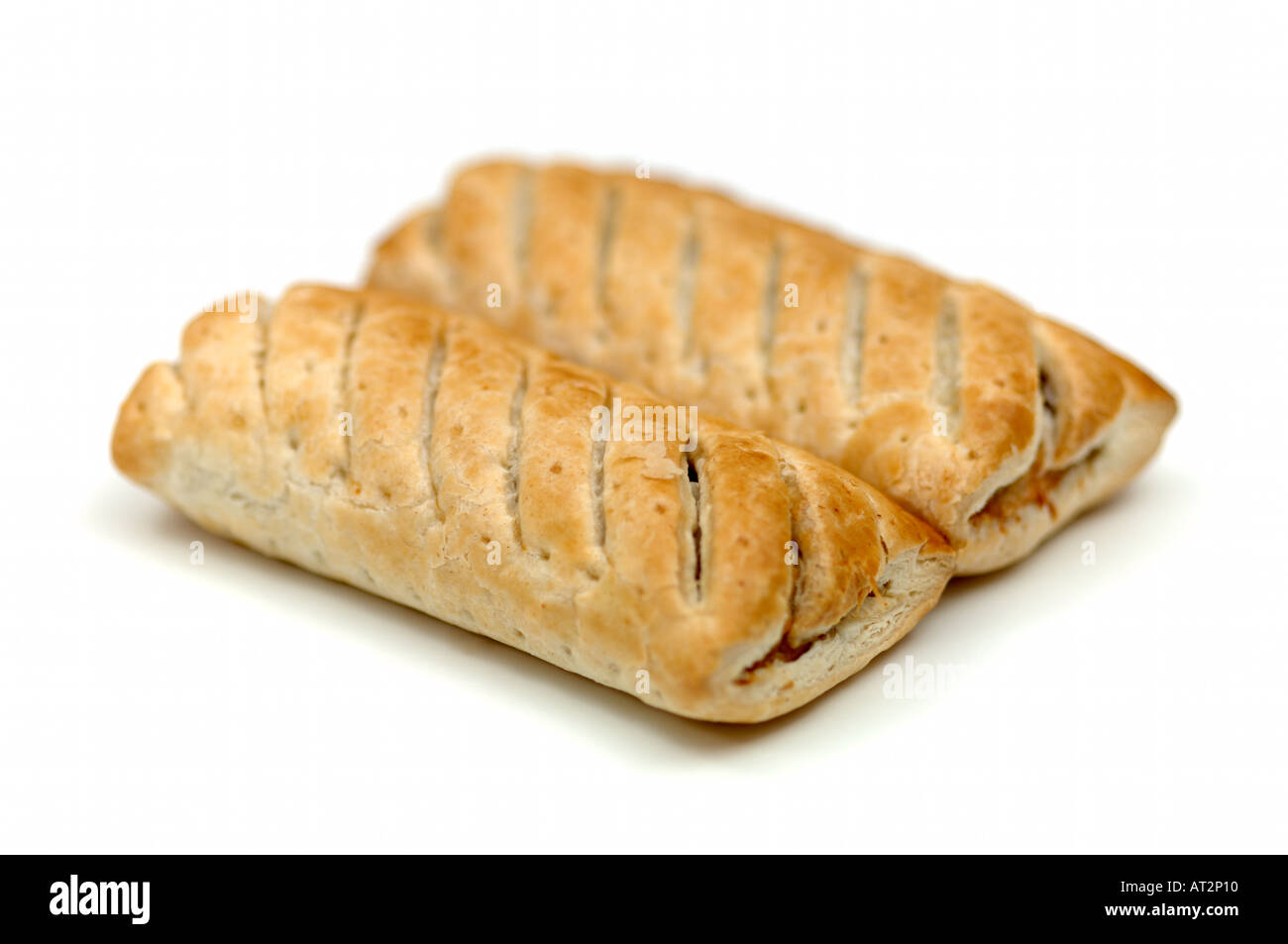 2 two sausage rolls, traditional english food on white background Stock ...