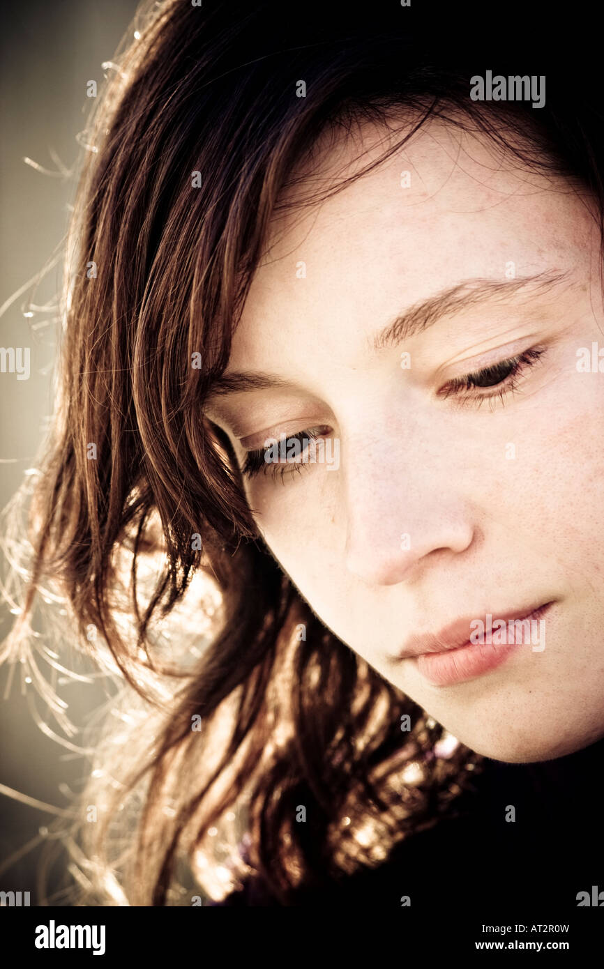Pensive young woman close portrait Stock Photo - Alamy