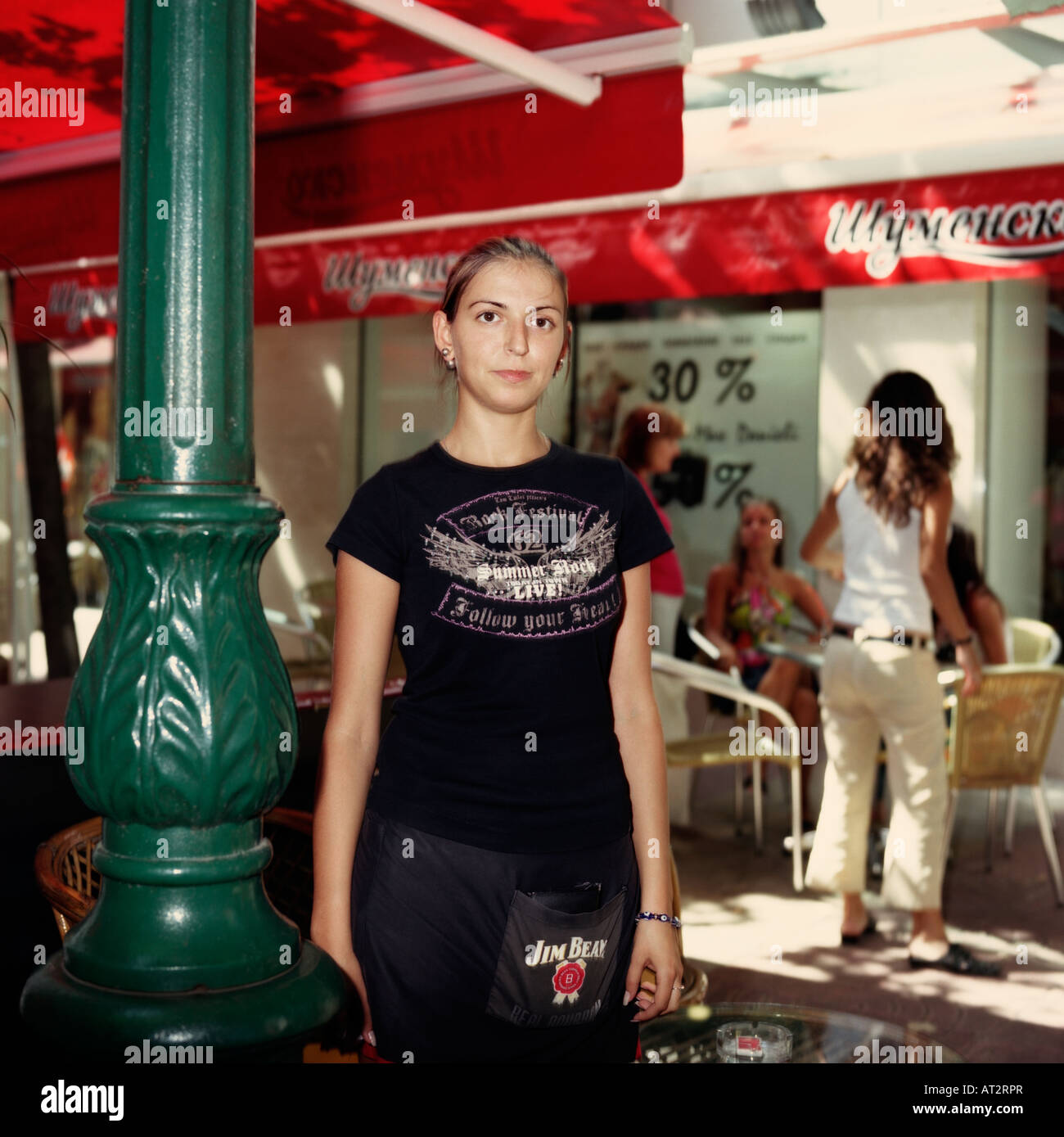 Waitress in an outdoors cafe in Bourgas,Bulgaria Stock Photo - Alamy