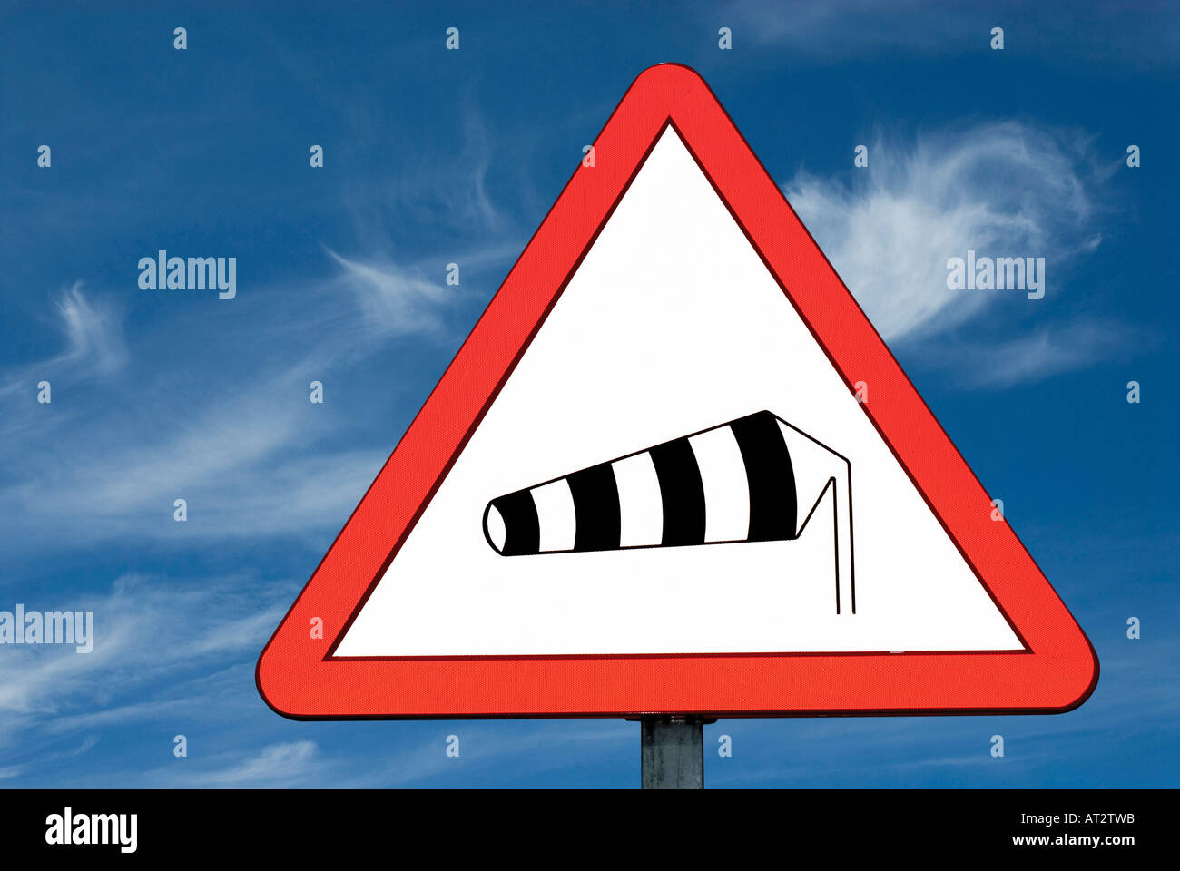 TRIANGLE TRAFFIC SIGN DANGER WIND ON BLUE CLOUDS SKY BACKGROUND Stock ...